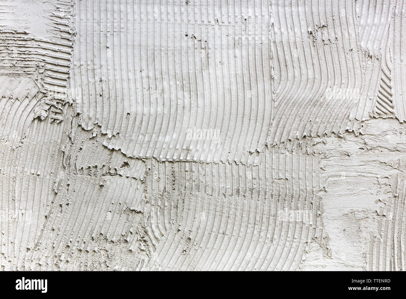 grey adhesive plaster stripes on wall. construction textured background ...