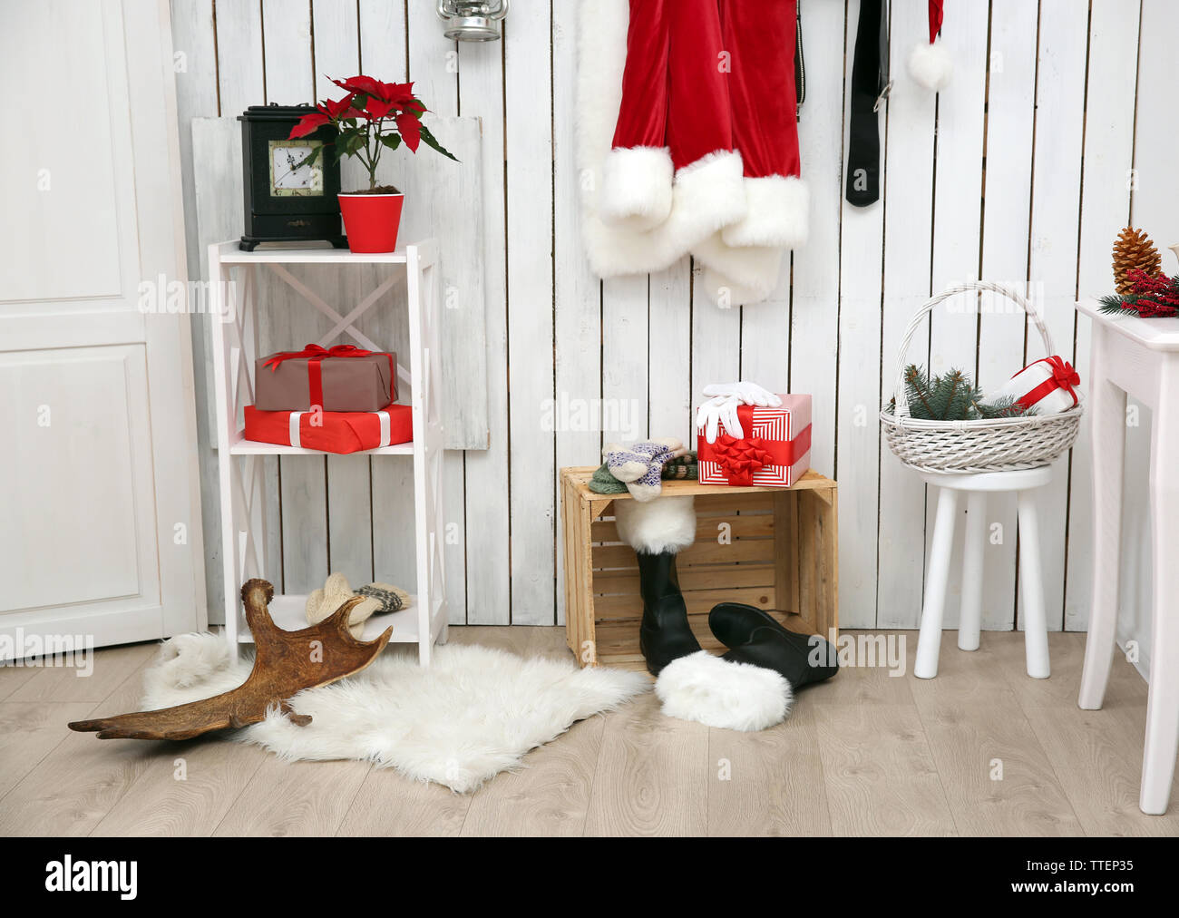 Interior of Santa Claus home on white wooden wall Stock Photo - Alamy