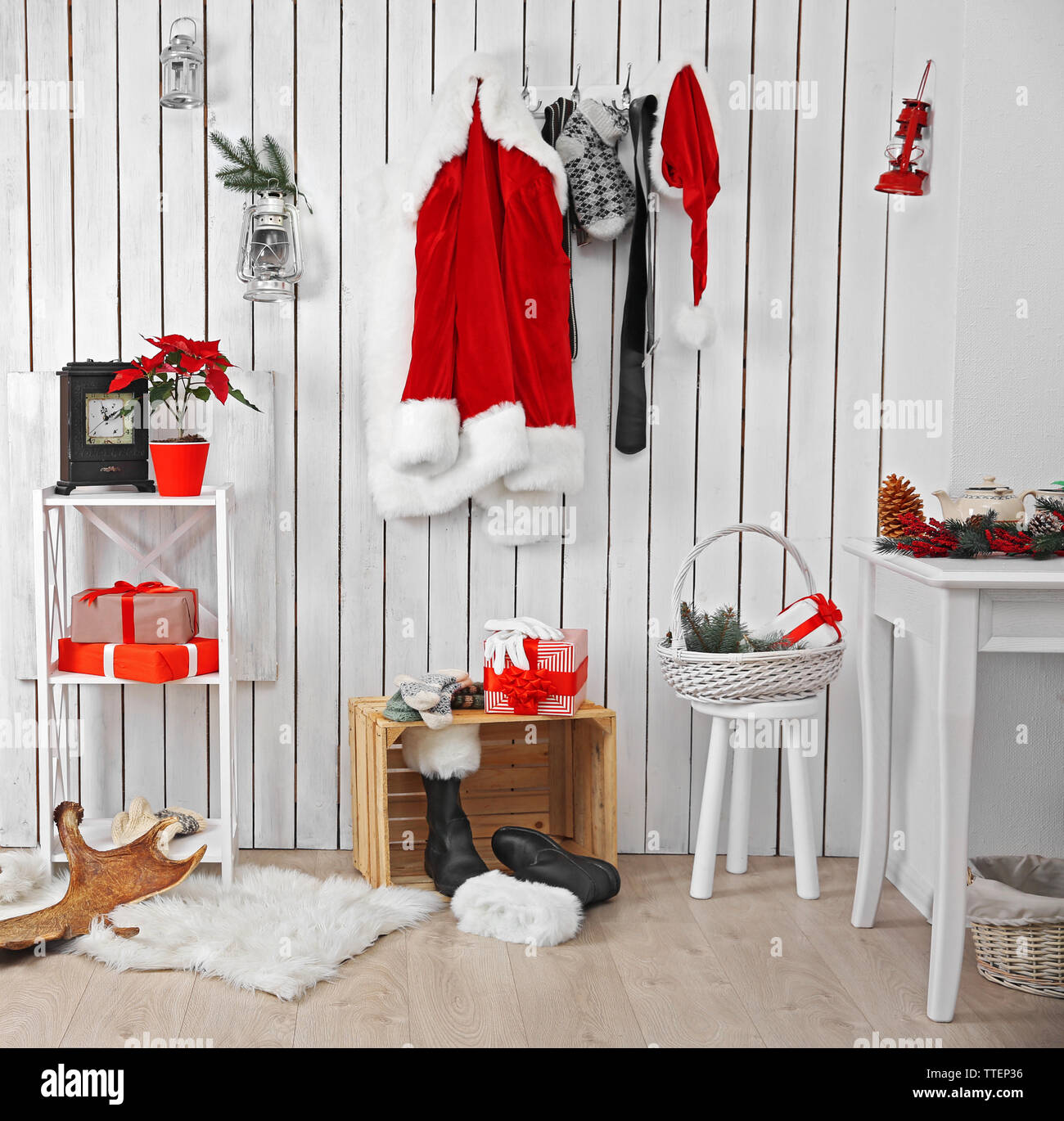 Interior of Santa Claus home on white wooden wall Stock Photo - Alamy