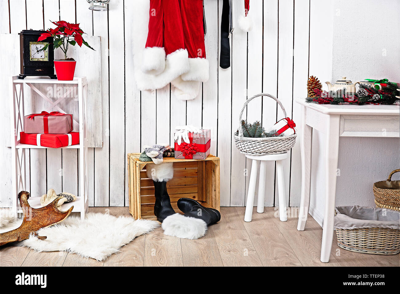 Interior of Santa Claus home on white wooden wall Stock Photo - Alamy