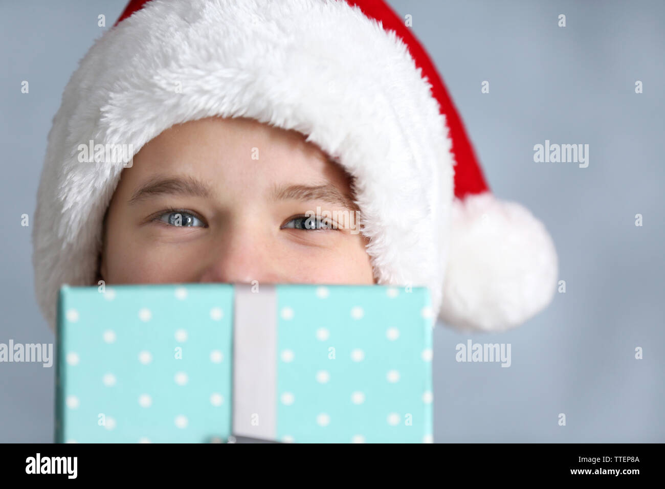 Portrait of cute boy with blue gift box, close up Stock Photo - Alamy