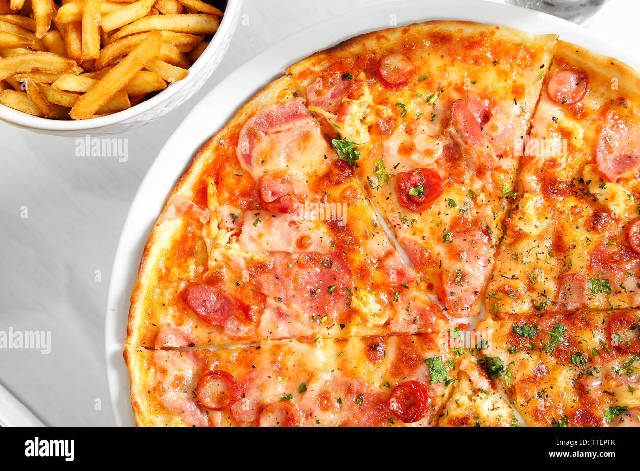 Table at home with pizza for friends, close up Stock Photo - Alamy