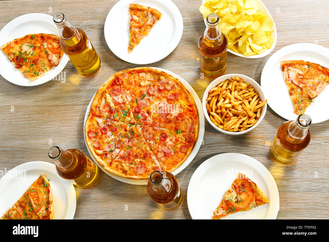 Table at home with pizza and drinks for friends Stock Photo - Alamy