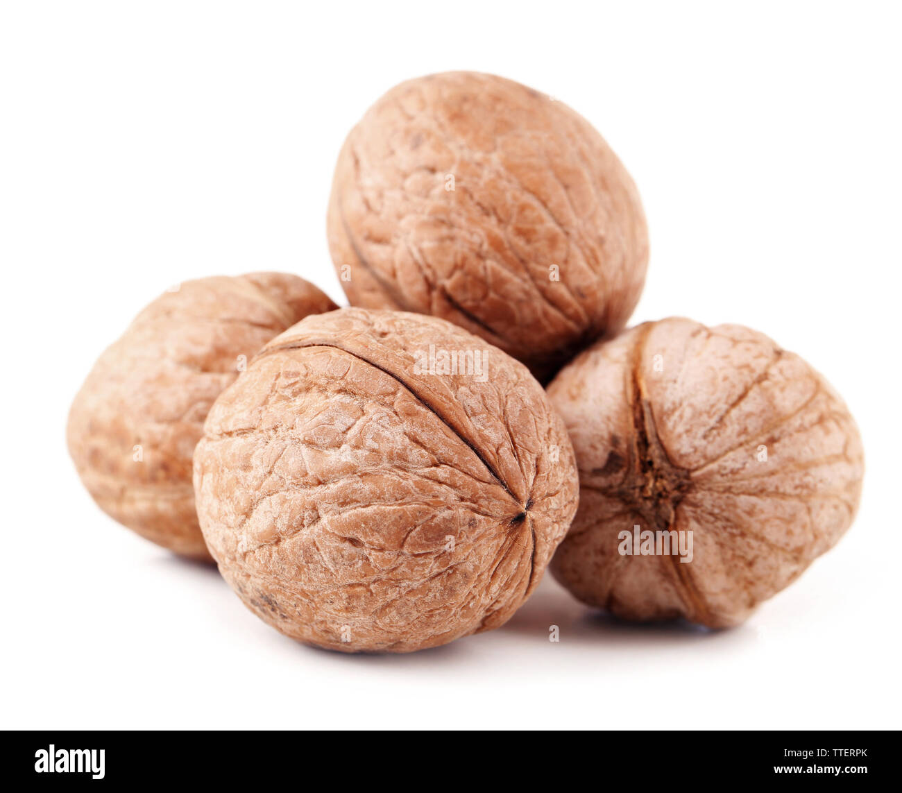 Pile of walnuts, isolated on white Stock Photo - Alamy