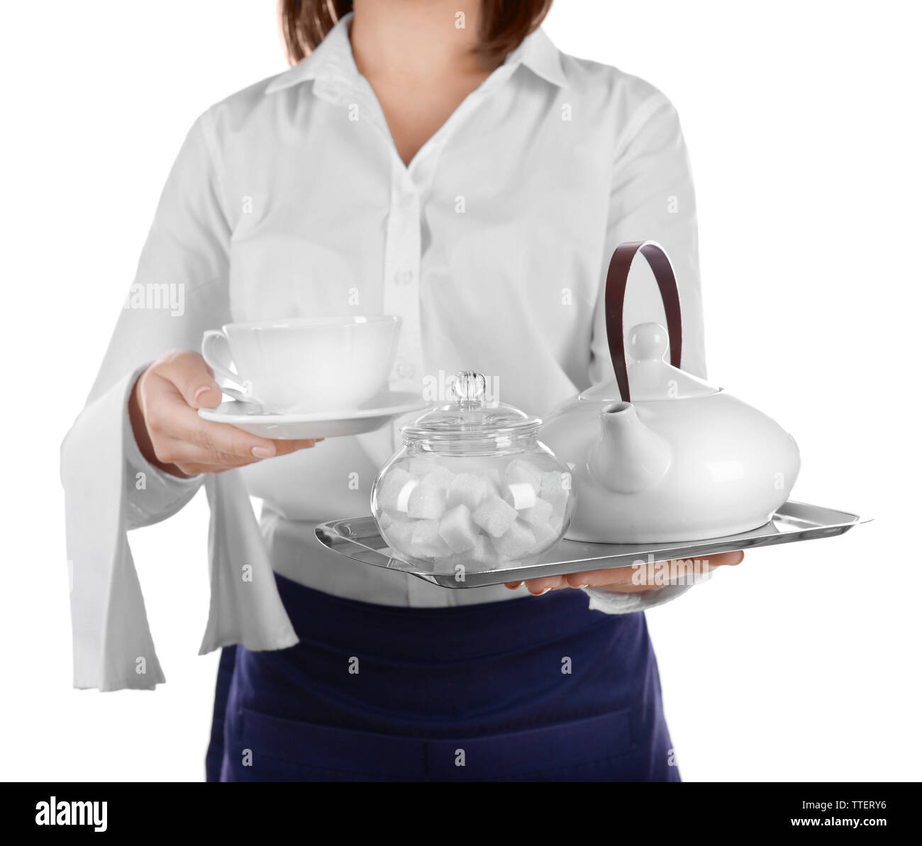 Waiter holding tray with teapot and cup on white background Stock Photo ...