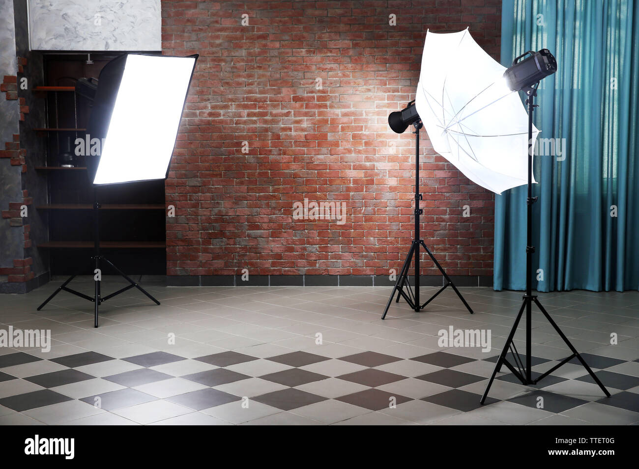 Empty photo studio with lighting equipment Stock Photo - Alamy