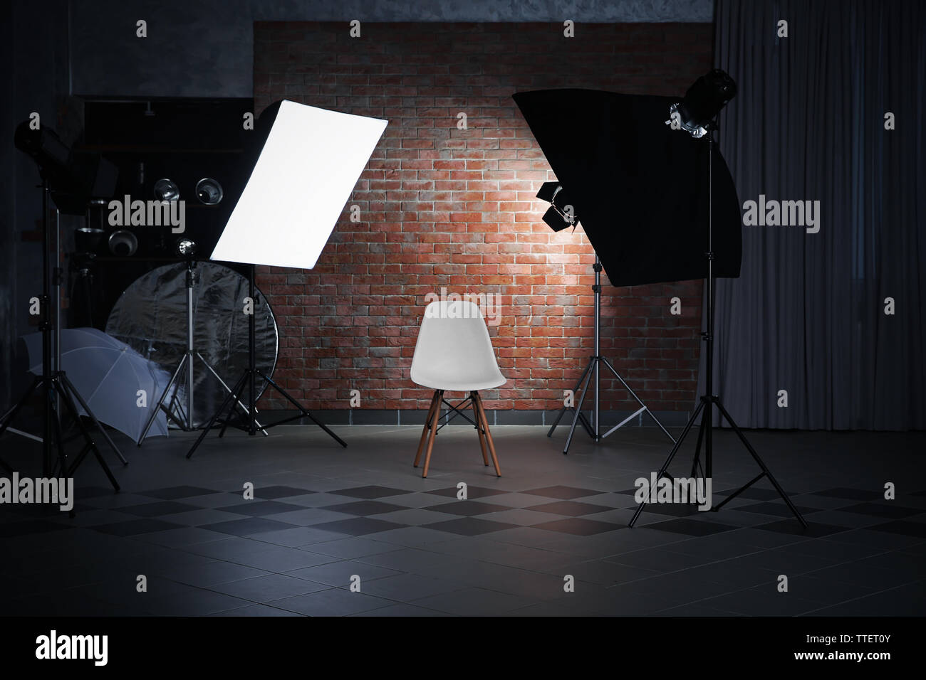 Empty photo studio with lighting equipment Stock Photo - Alamy