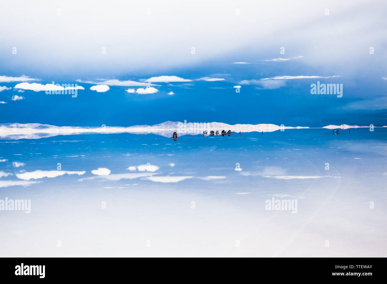 The Salar de Uyuni flooded after the rains, Bolivia. Clouds reflected ...