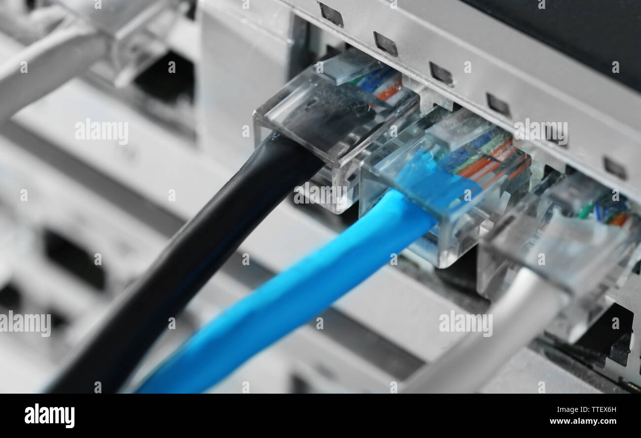 Ethernet cables connected to network switch, close up Stock Photo - Alamy