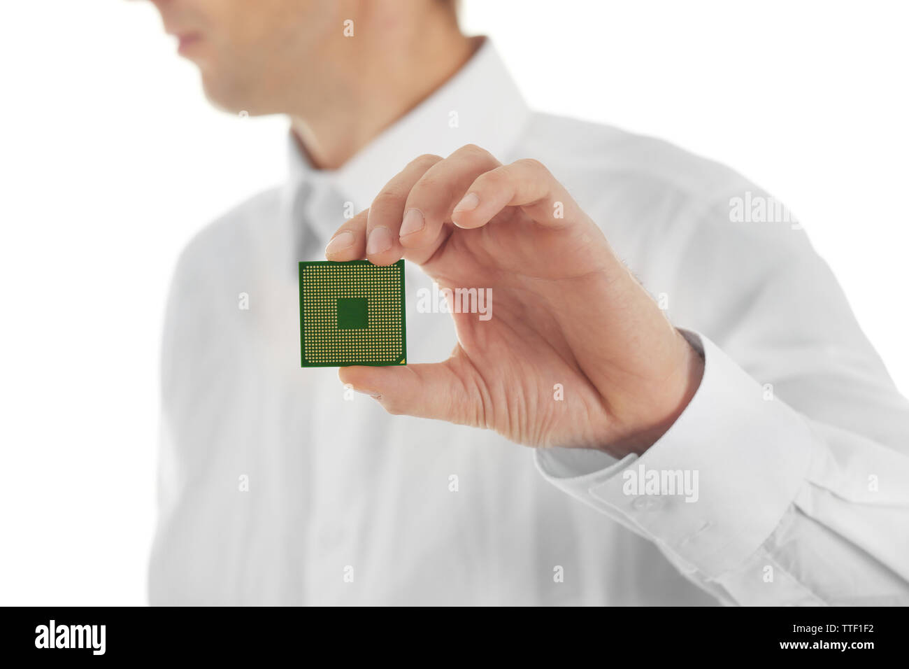 Man holding microprocessor in his hand on white background Stock Photo ...