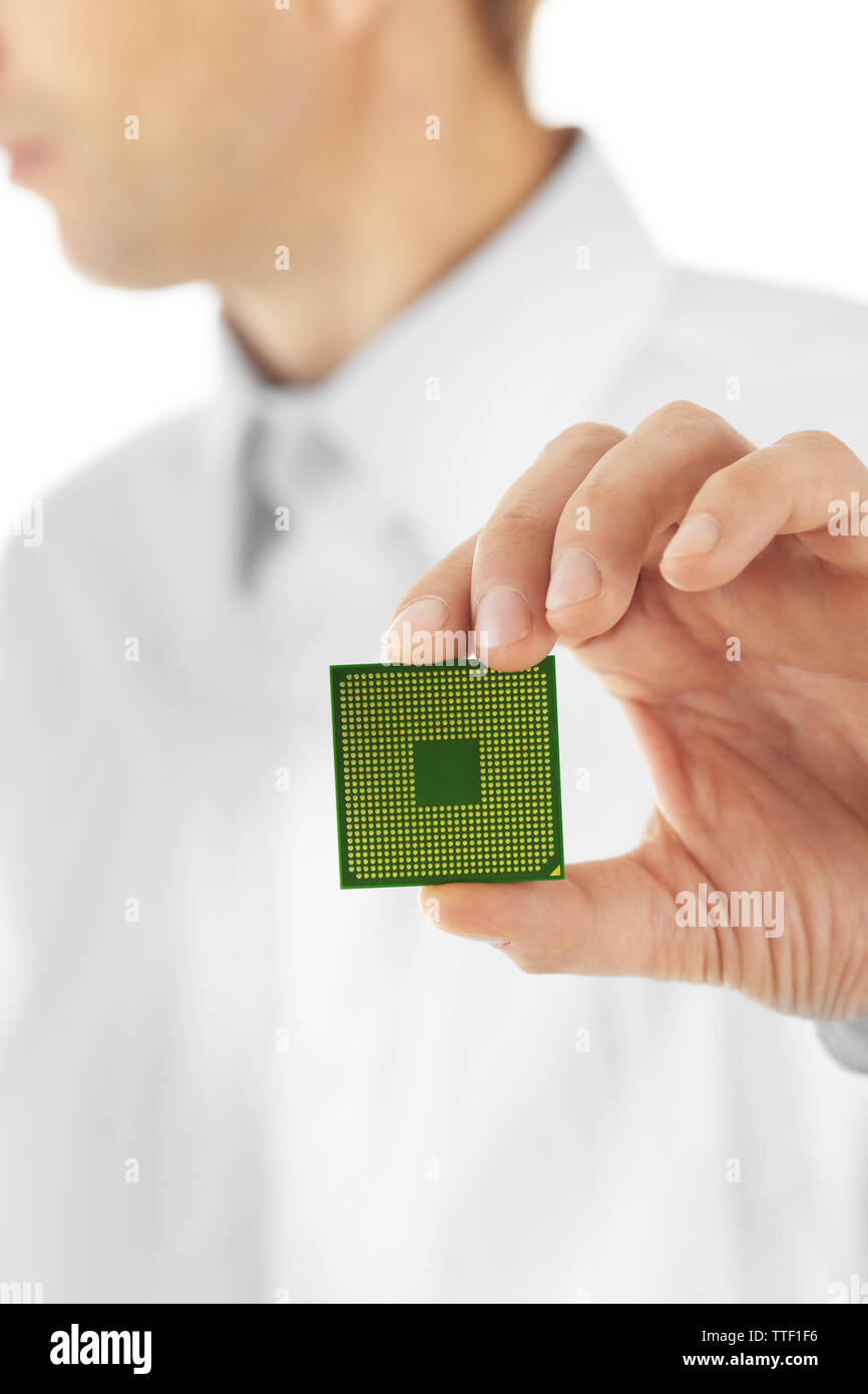Man holding microprocessor in his hand on white background Stock Photo ...