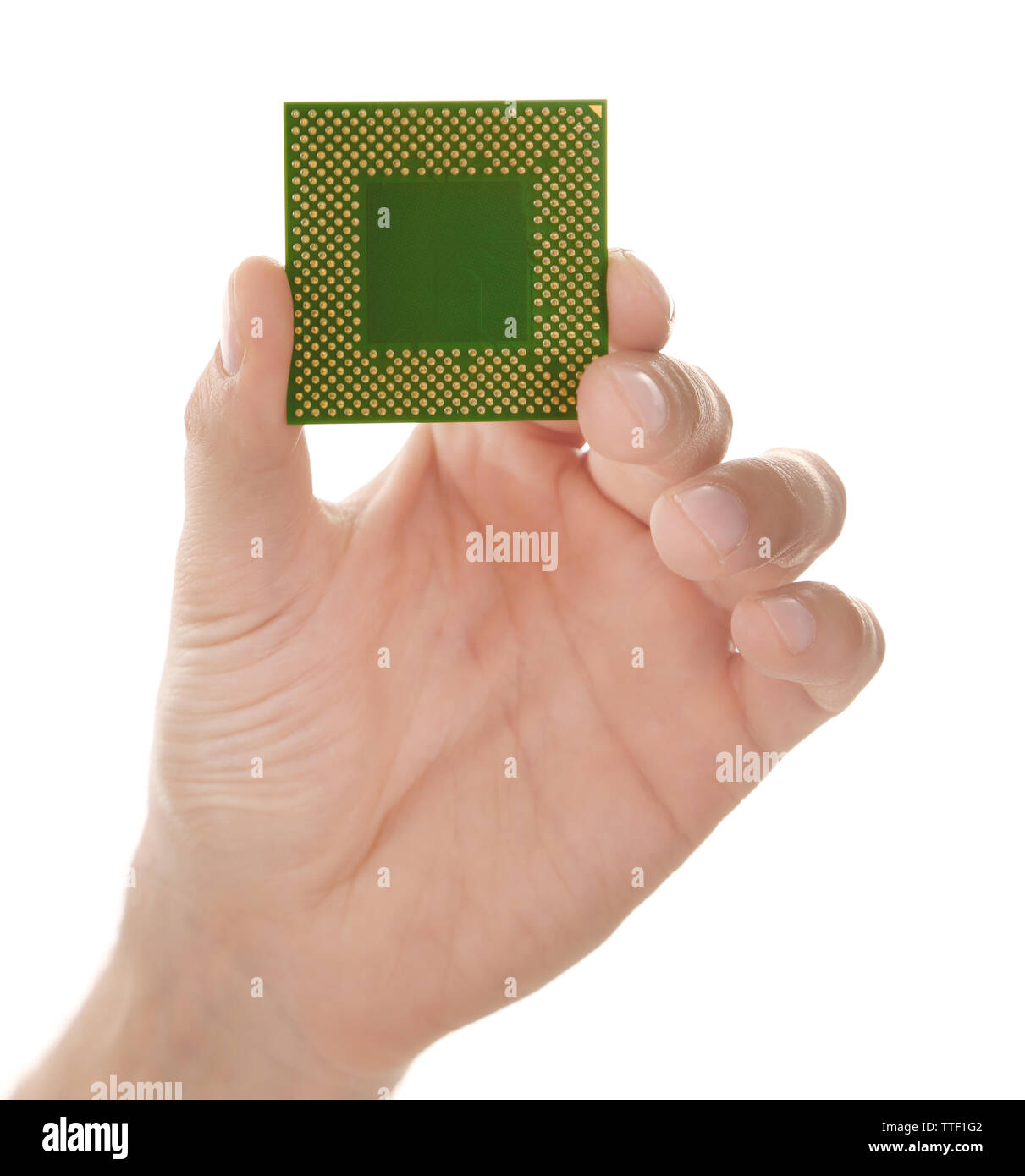 Male hand holding microprocessor on white background Stock Photo - Alamy
