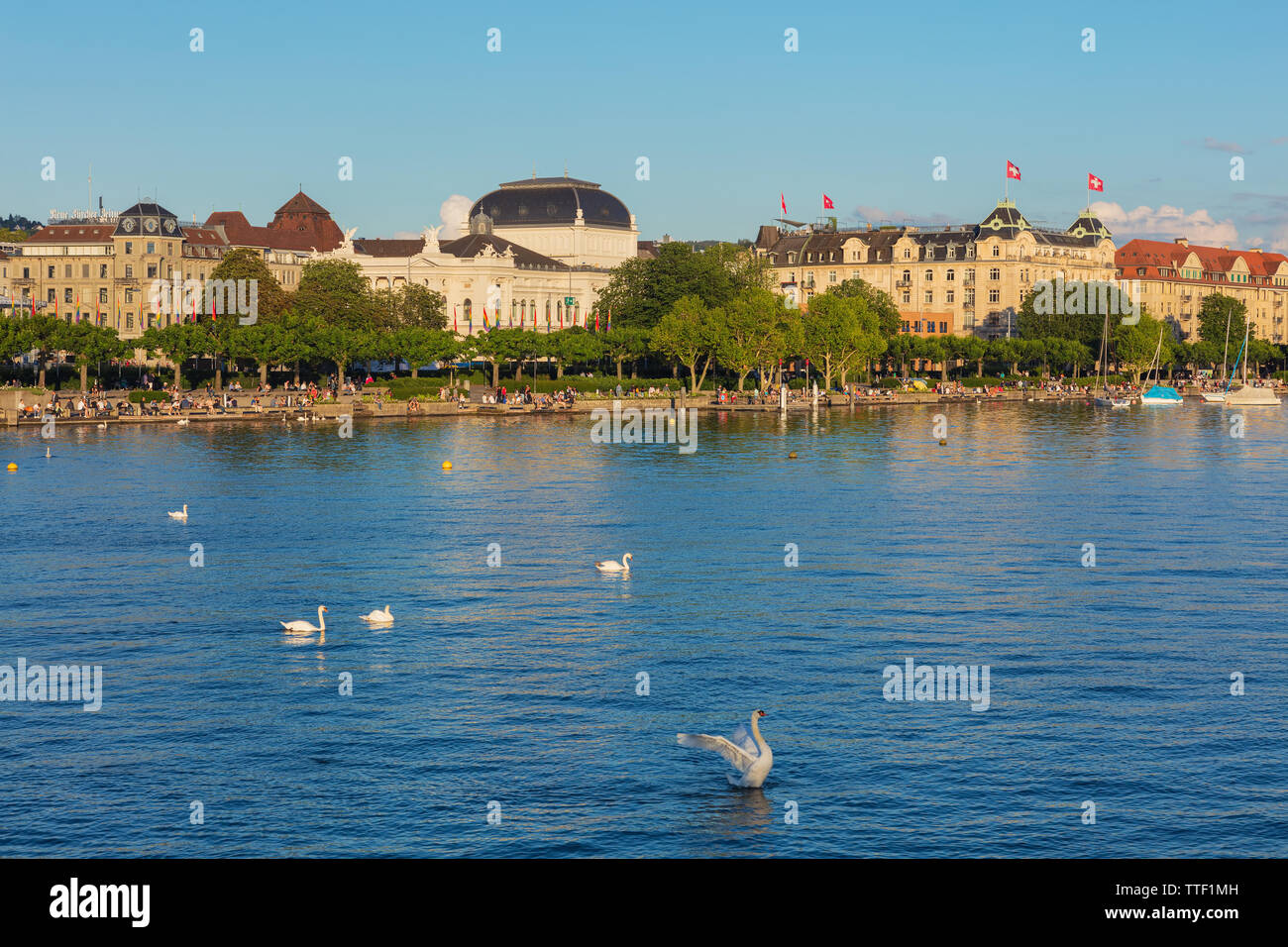 Zurich, Switzerland - June 16, 2019: Lake Zurich at sunset, people on ...