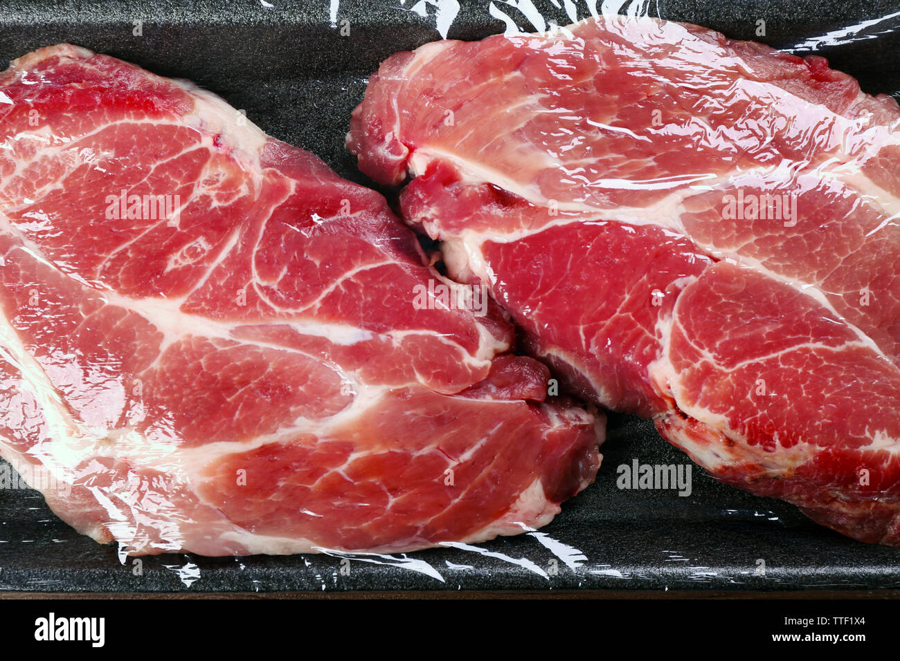 Packed pieces of pork meat, close up Stock Photo - Alamy