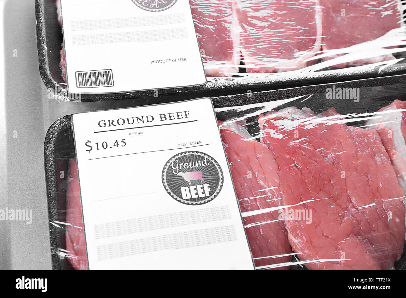 Packed pieces of pork and beef meat on metal background Stock Photo - Alamy