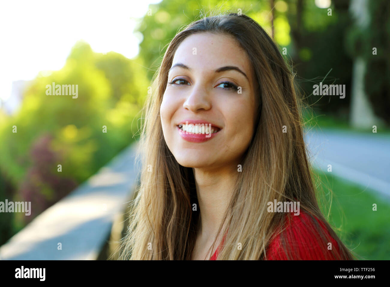 Outside park portrait smile smiling teenager white woman hi-res stock ...
