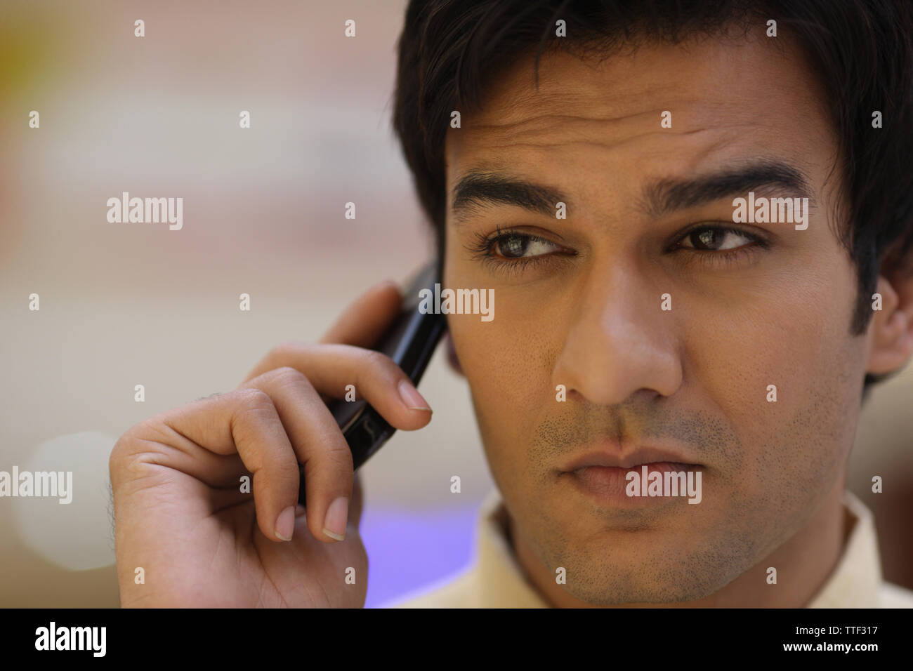 Indian adult man hearing hi-res stock photography and images - Alamy