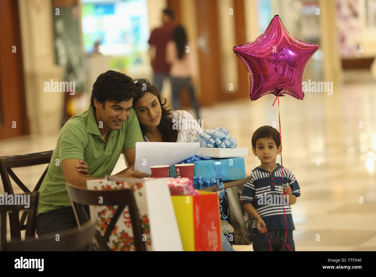 Indian family gifts in hi-res stock photography and images - Alamy