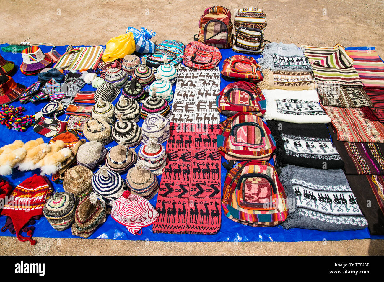Traditional handcrafts on the market in main street of Uyuni, Bolivia ...