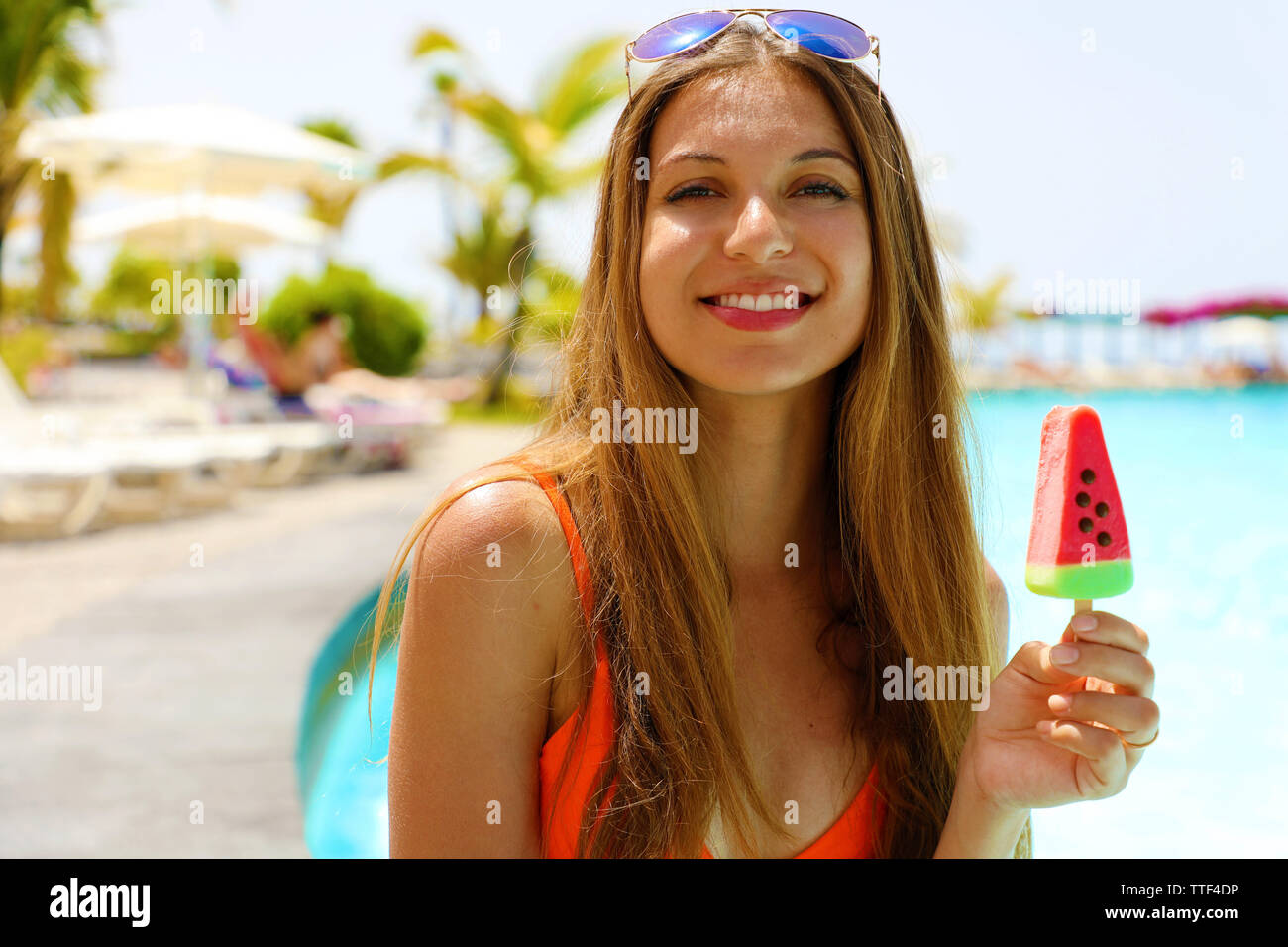 Fashion Smiling Beautiful Girl Eating Popsicle Ice Pop In Form Of
