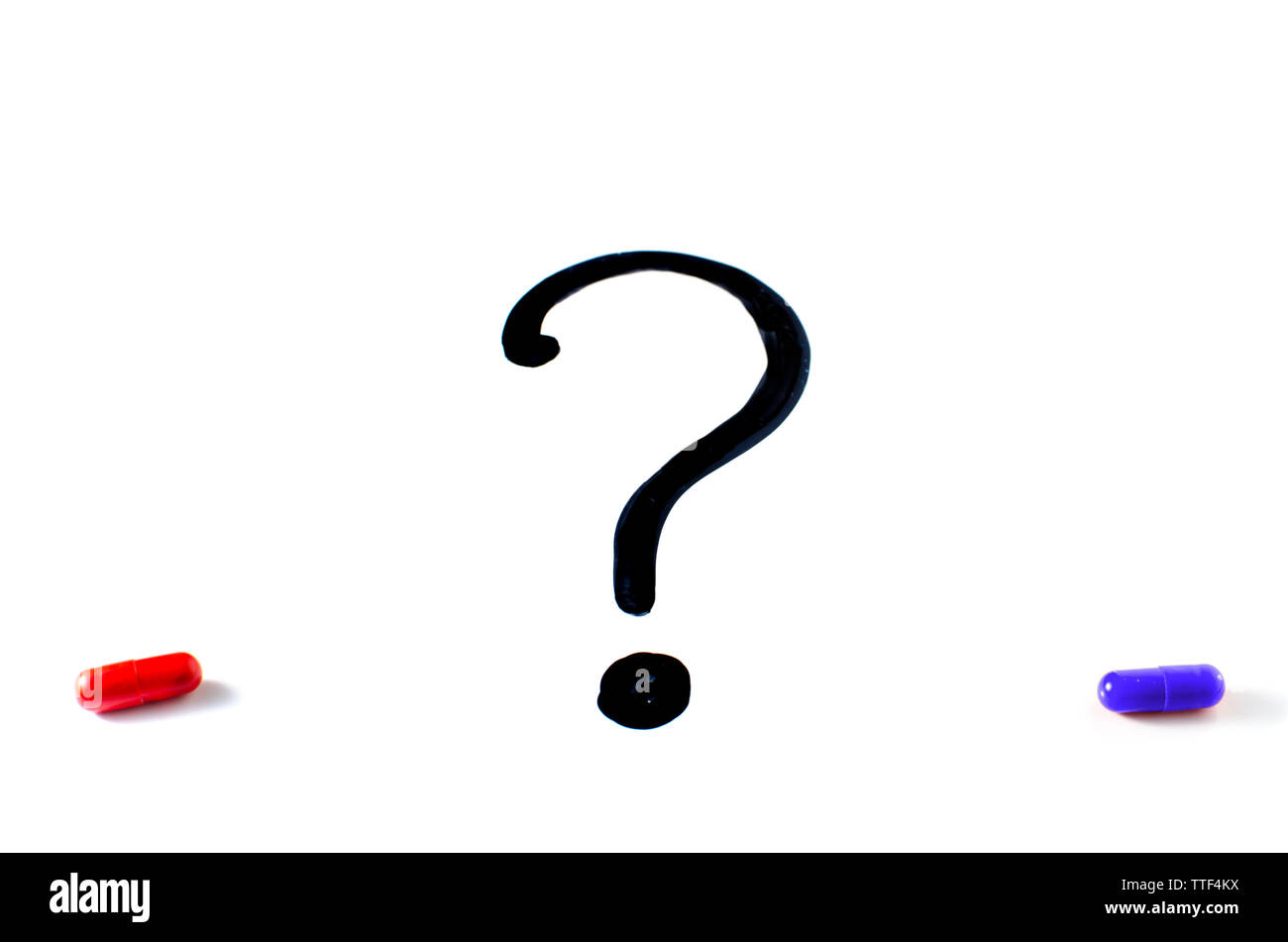 Red and blue pill, and a question mark on white background Stock Photo ...