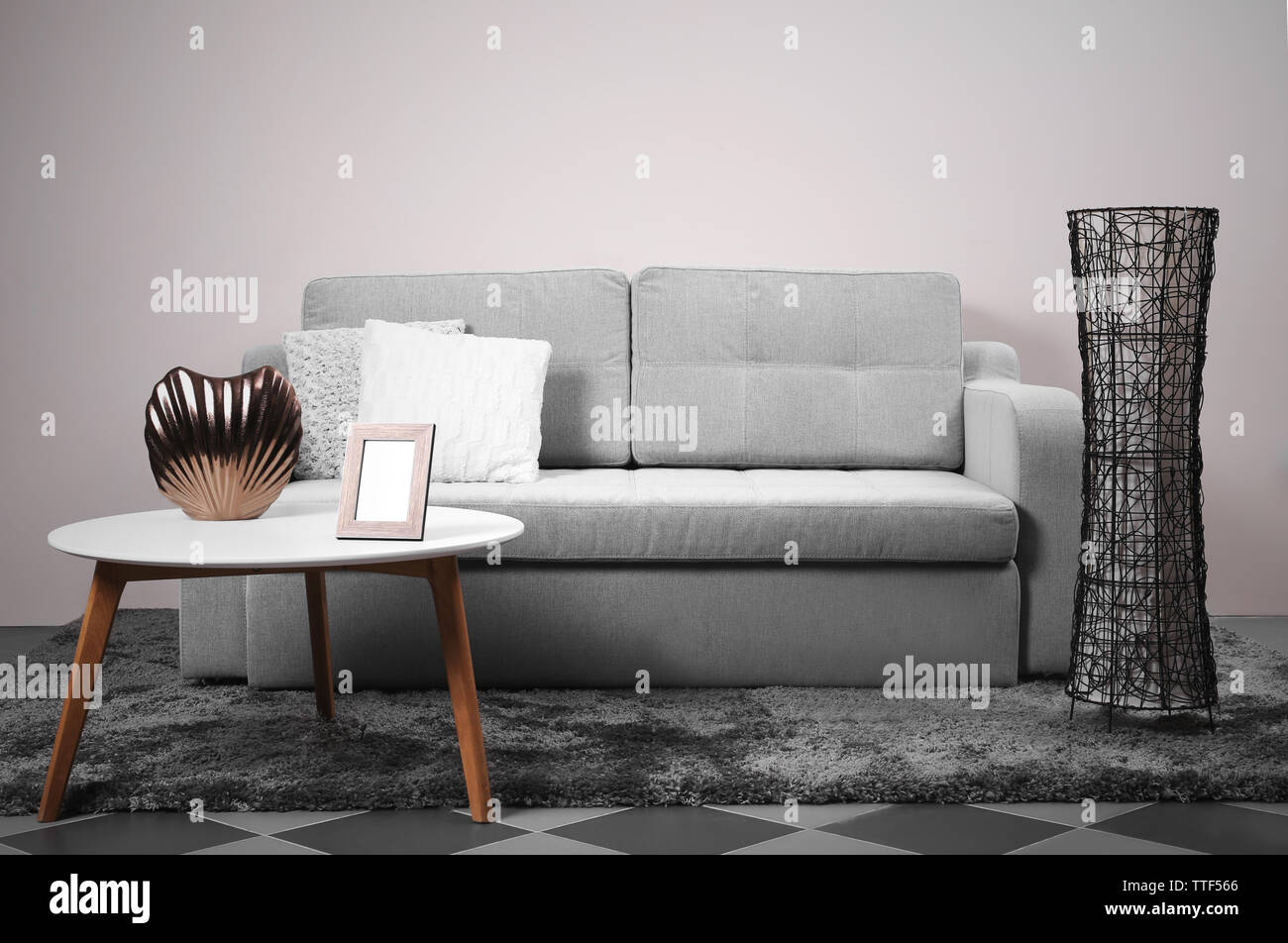 Interior with modern furniture: sofa, table, lamp Stock Photo - Alamy