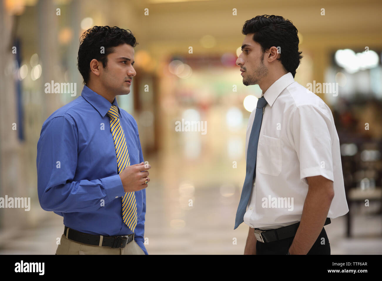 Two business executives discussing in an office Stock Photo - Alamy
