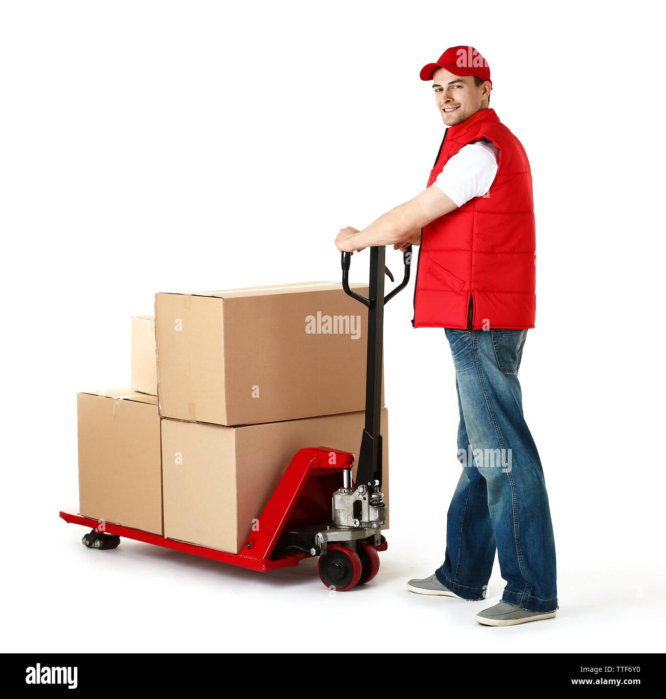 Delivery man with hand truck isolated on white background Stock Photo ...