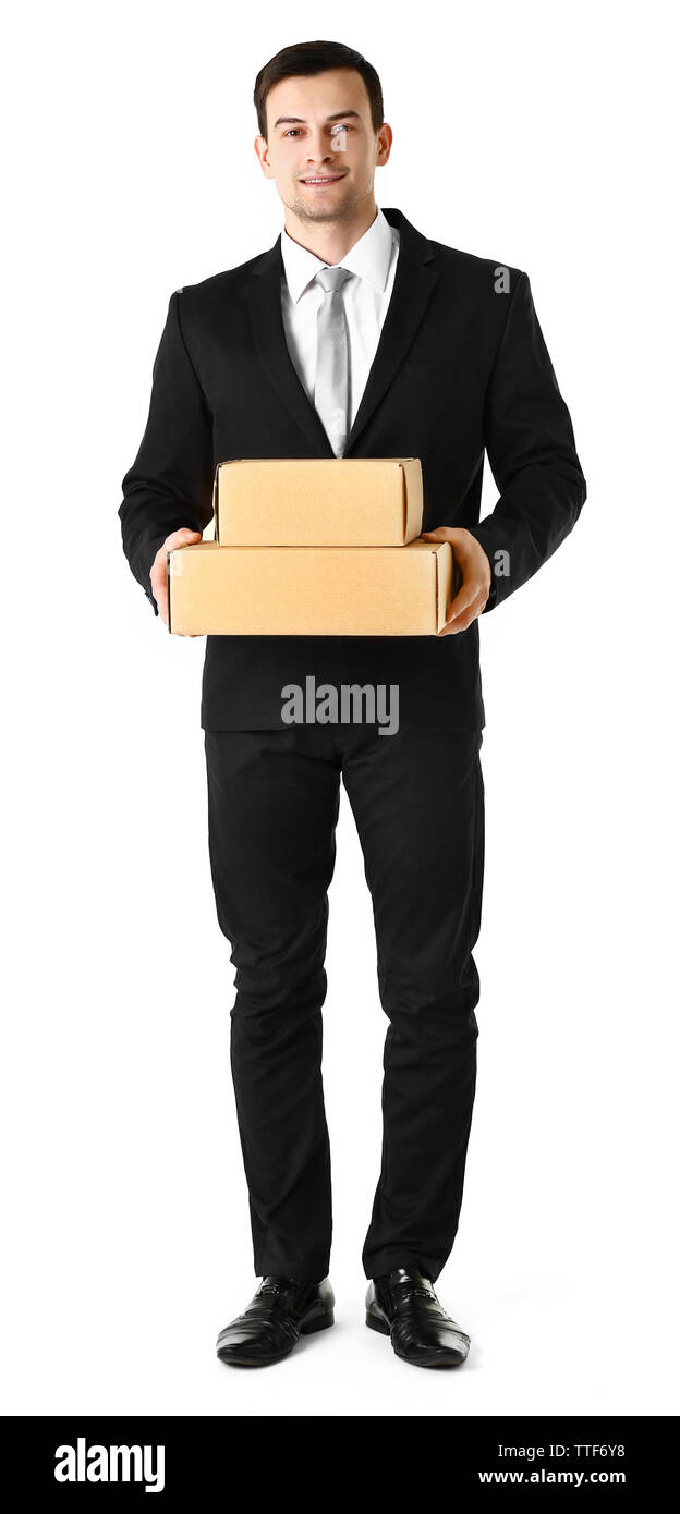 Man in suit holding carton boxes isolated on white background Stock ...