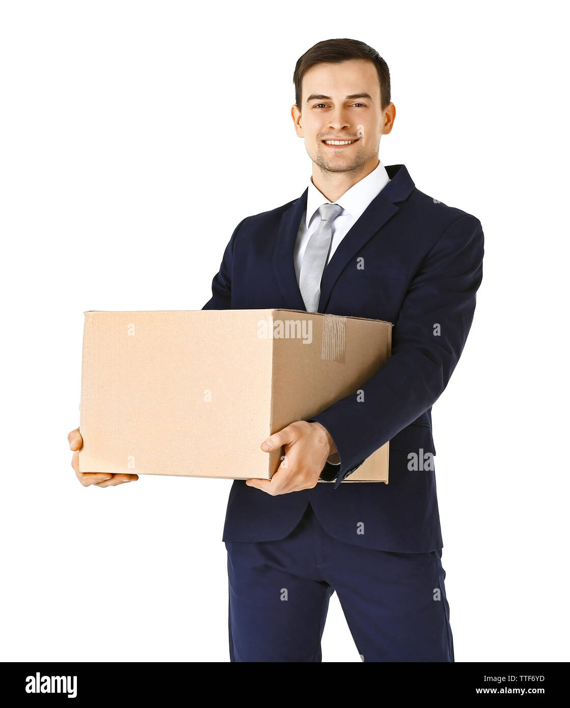 Man in suit holding carton boxes isolated on white background Stock ...