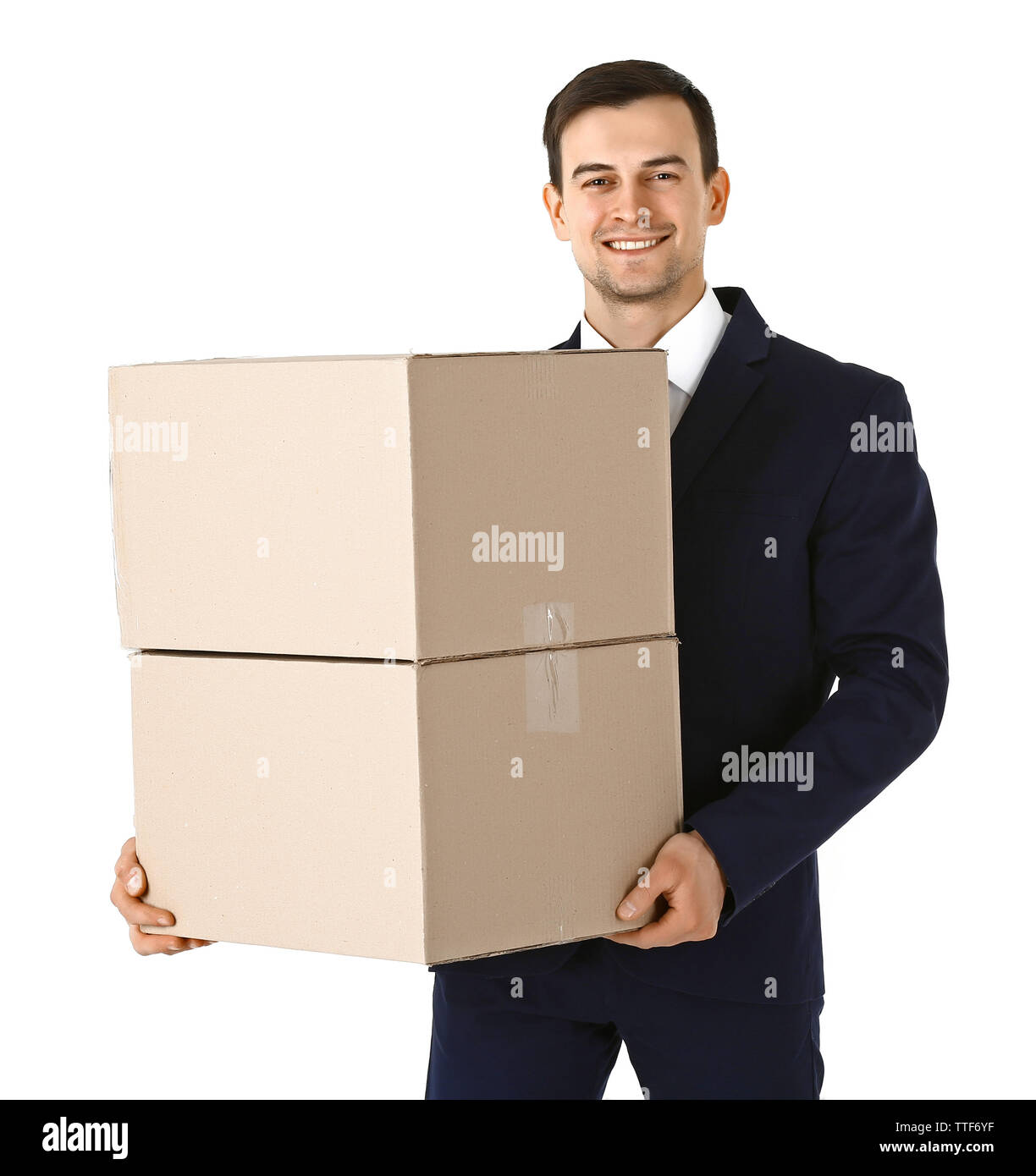 Man in suit holding carton boxes isolated on white background Stock ...
