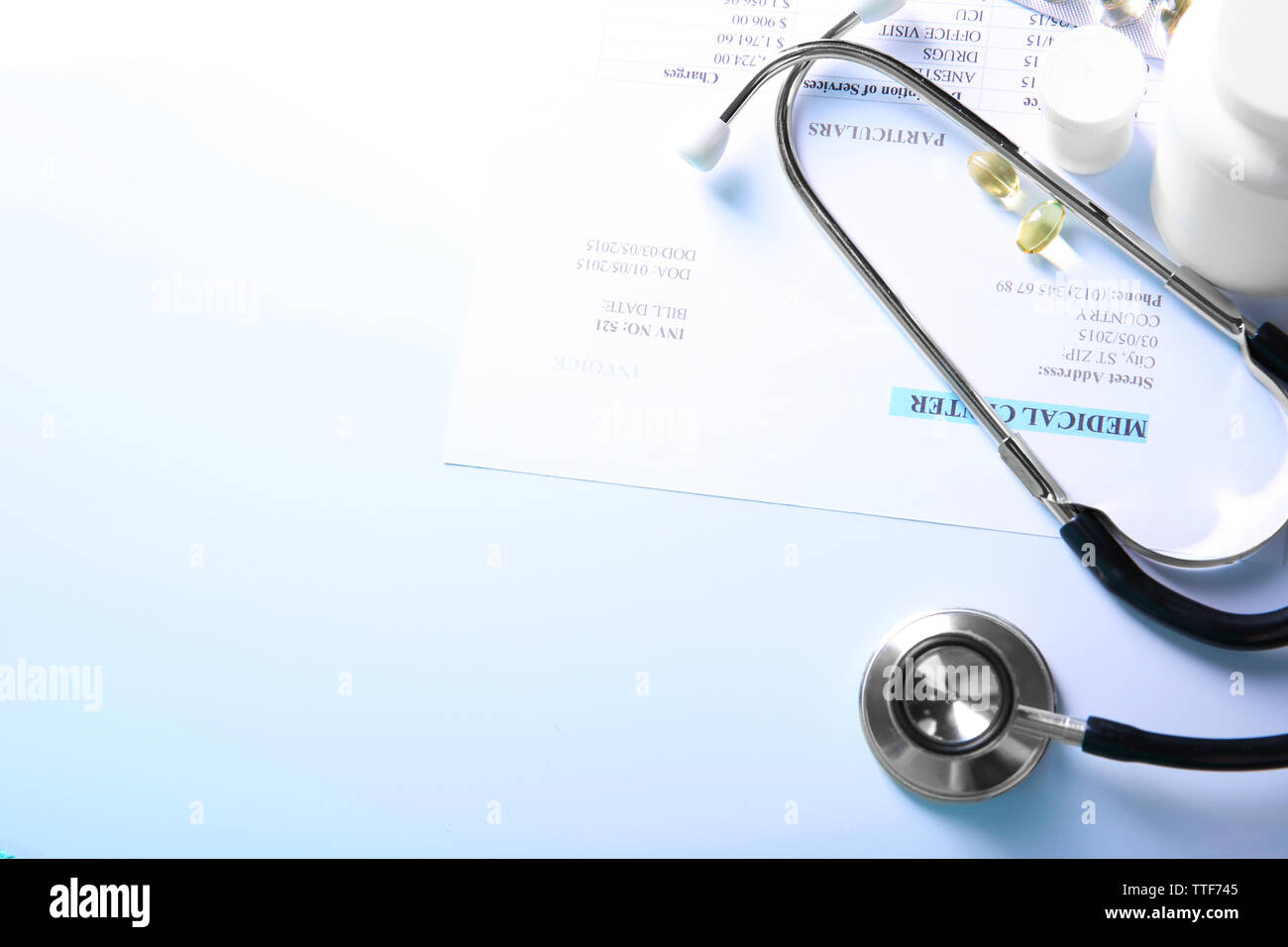 Stethoscope and medical equipment on a light background Stock Photo - Alamy