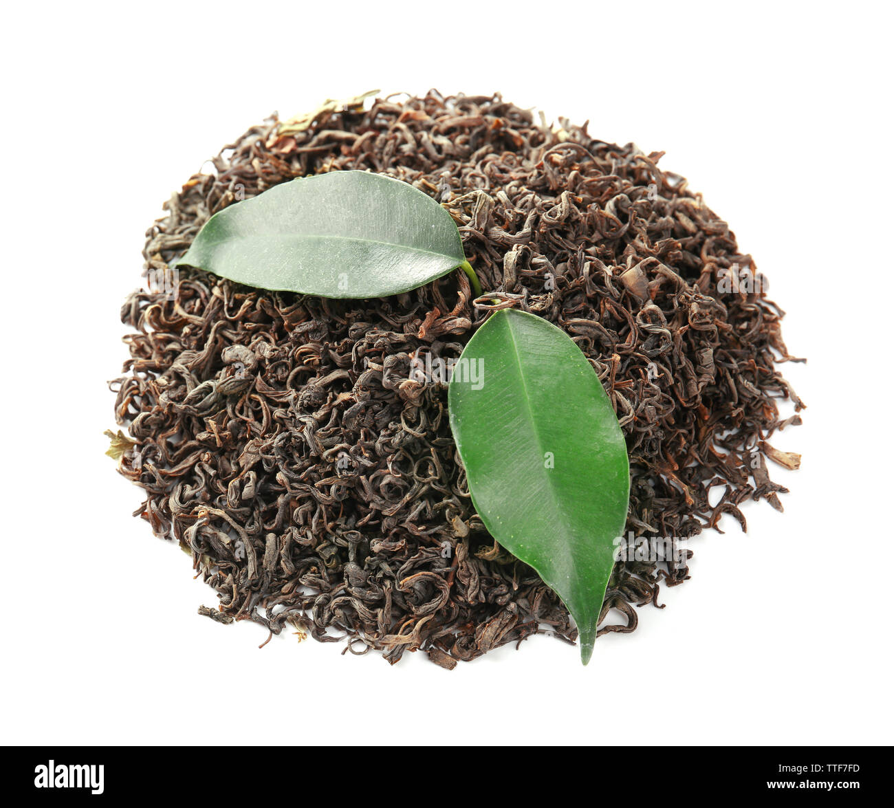 Pile of dry tea with green leaves, isolated on white Stock Photo - Alamy