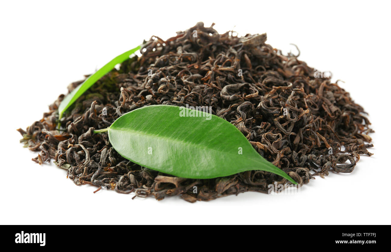 Pile of dry tea with green leaves, isolated on white Stock Photo - Alamy