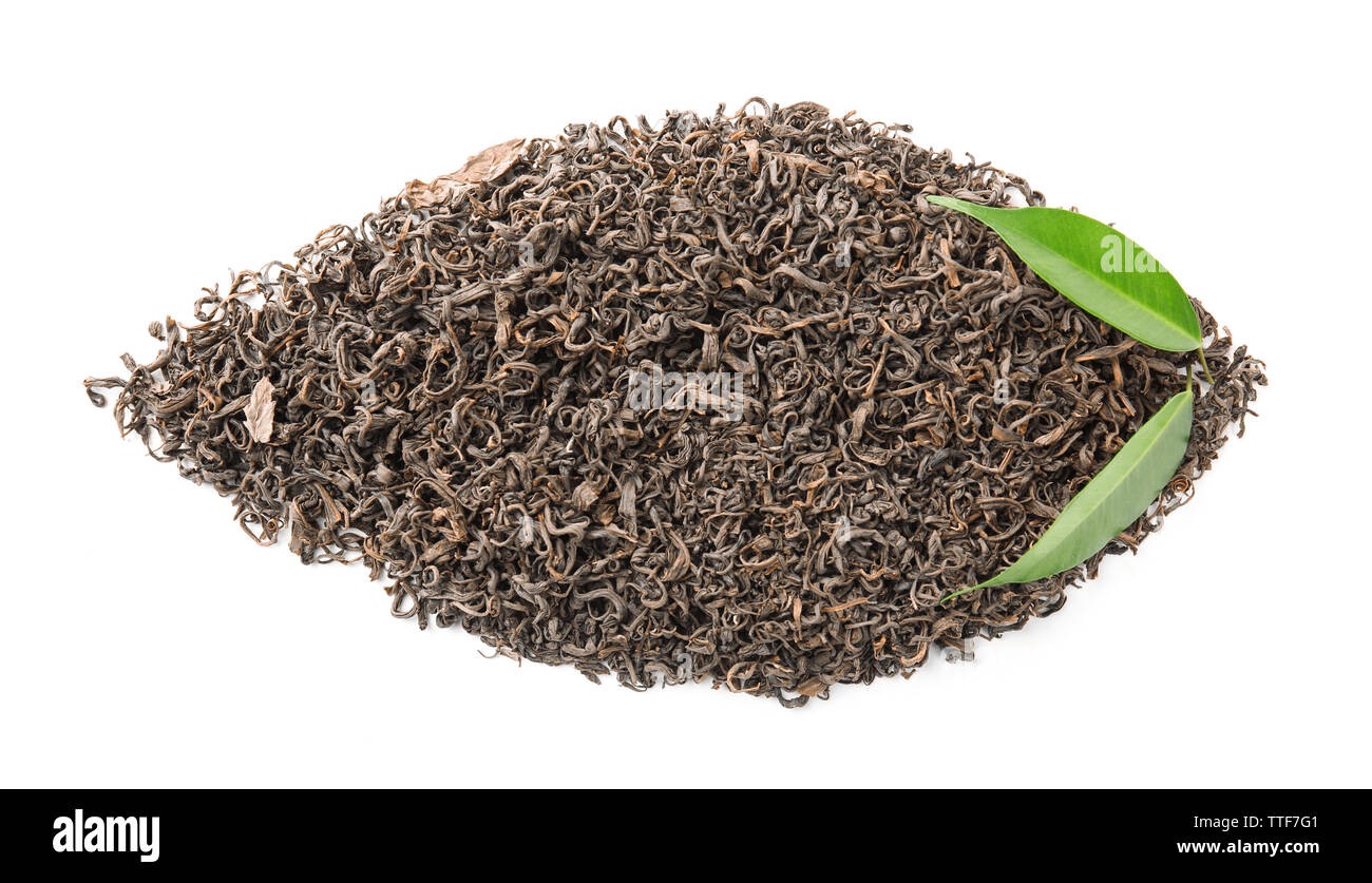 Pile of dry tea with green leaves, isolated on white Stock Photo - Alamy