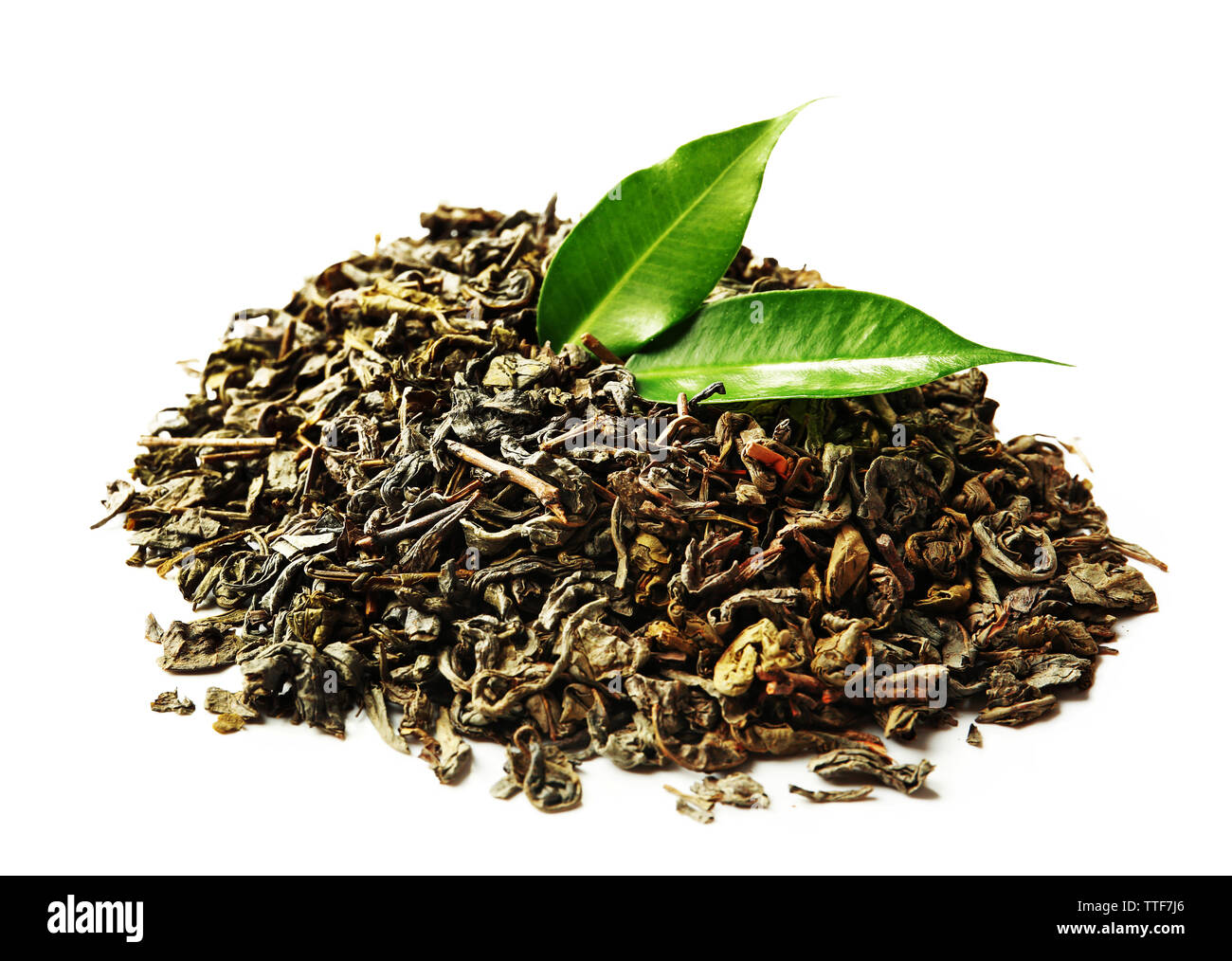 Pile of dry tea with green leaves, isolated on white Stock Photo - Alamy