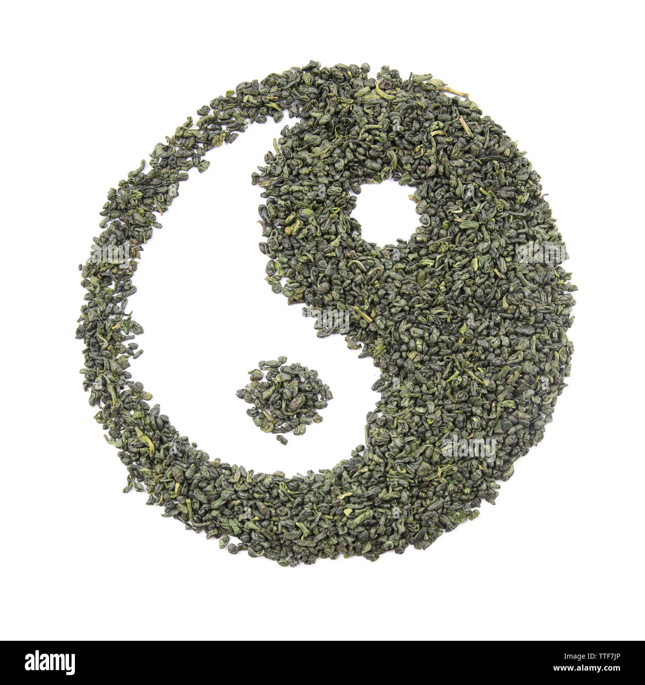 Ying yang sign made of dry tea, isolated on white Stock Photo - Alamy