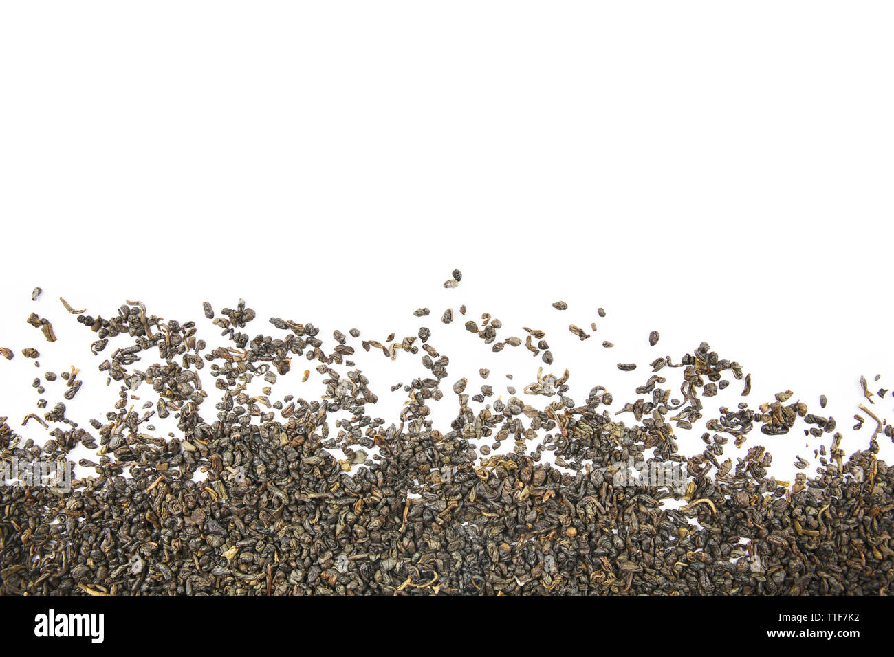 Pile of dry tea, isolated on white Stock Photo - Alamy