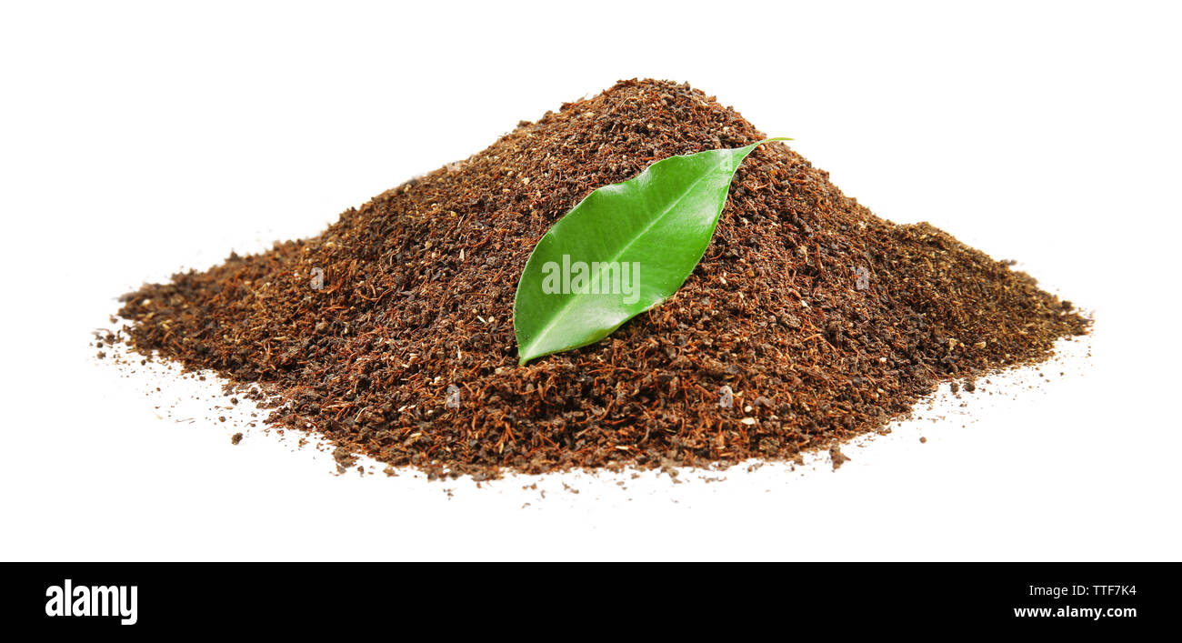 Pile of dry tea with green leaf, isolated on white Stock Photo - Alamy