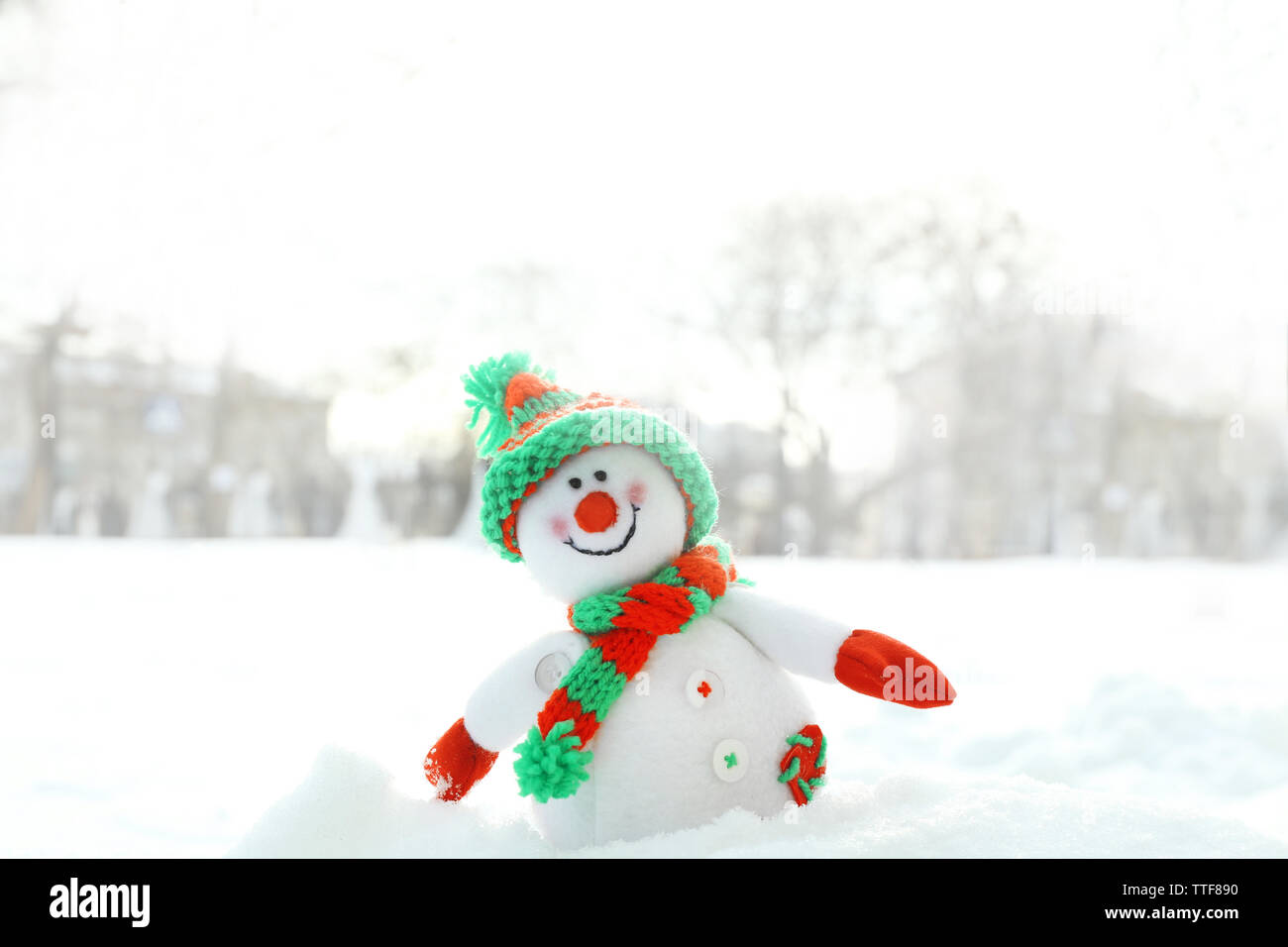 Beautiful snowman on natural snowdrift, close up Stock Photo - Alamy