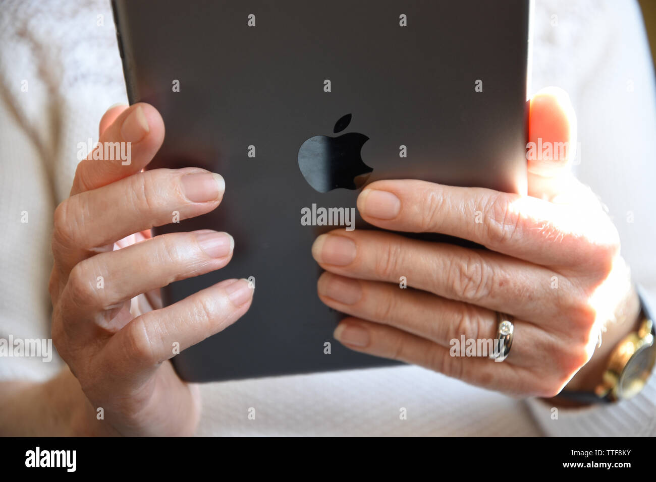 Woman Holding An Ipad High Resolution Stock Photography and Images - Alamy