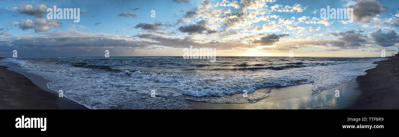 Spectacular panoramic sunset on the Roman coast in Ostia Lido with ...