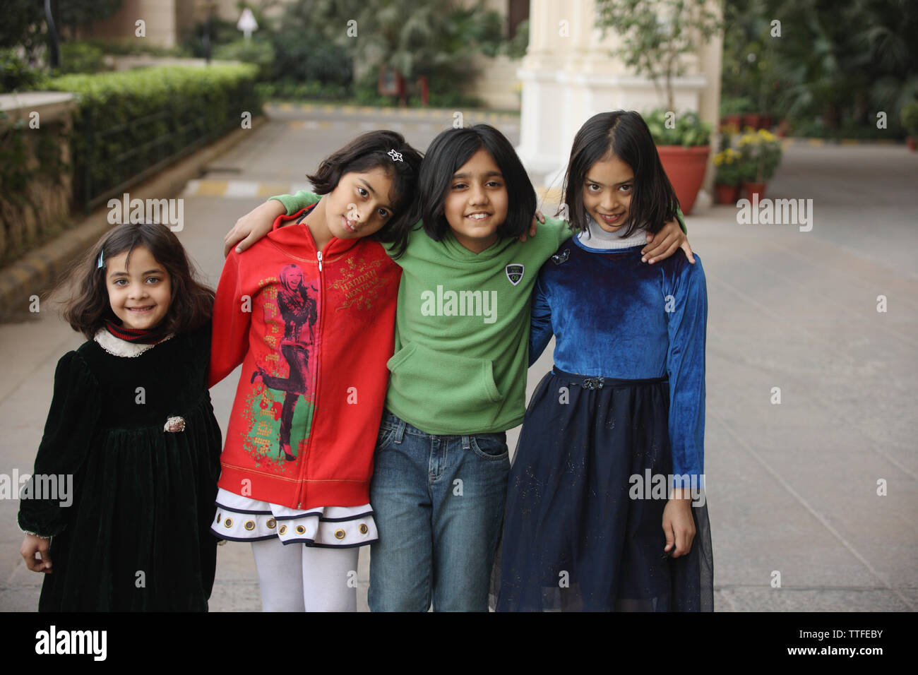 Portrait of girls standing together Stock Photo - Alamy