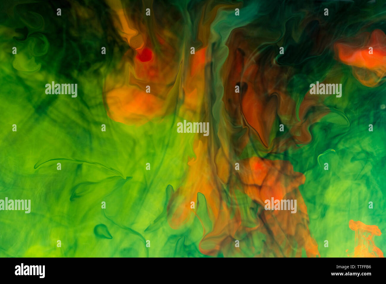 Colors dissolved in liquid Stock Photo - Alamy