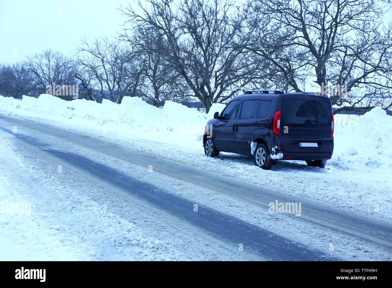 Car standing on roadside winter road, outdoor Stock Photo - Alamy