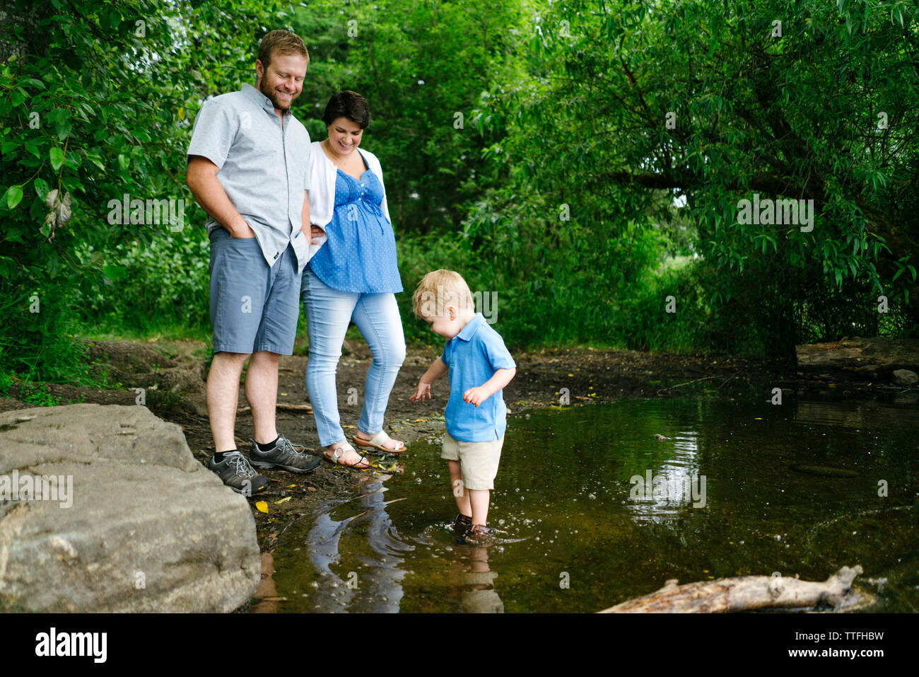 Three children playing lake hi-res stock photography and images - Alamy