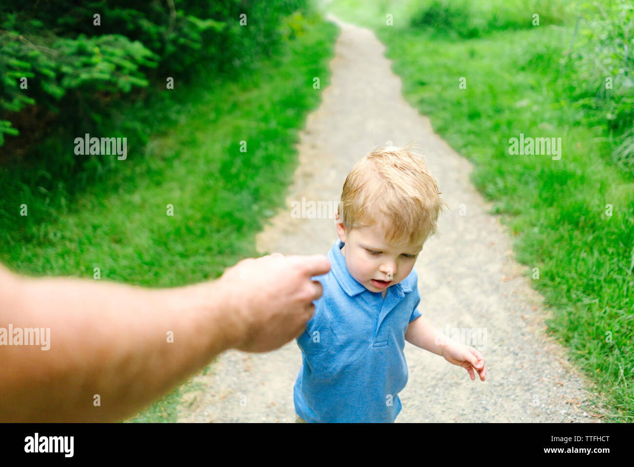 Hand reaching out child hi-res stock photography and images - Alamy