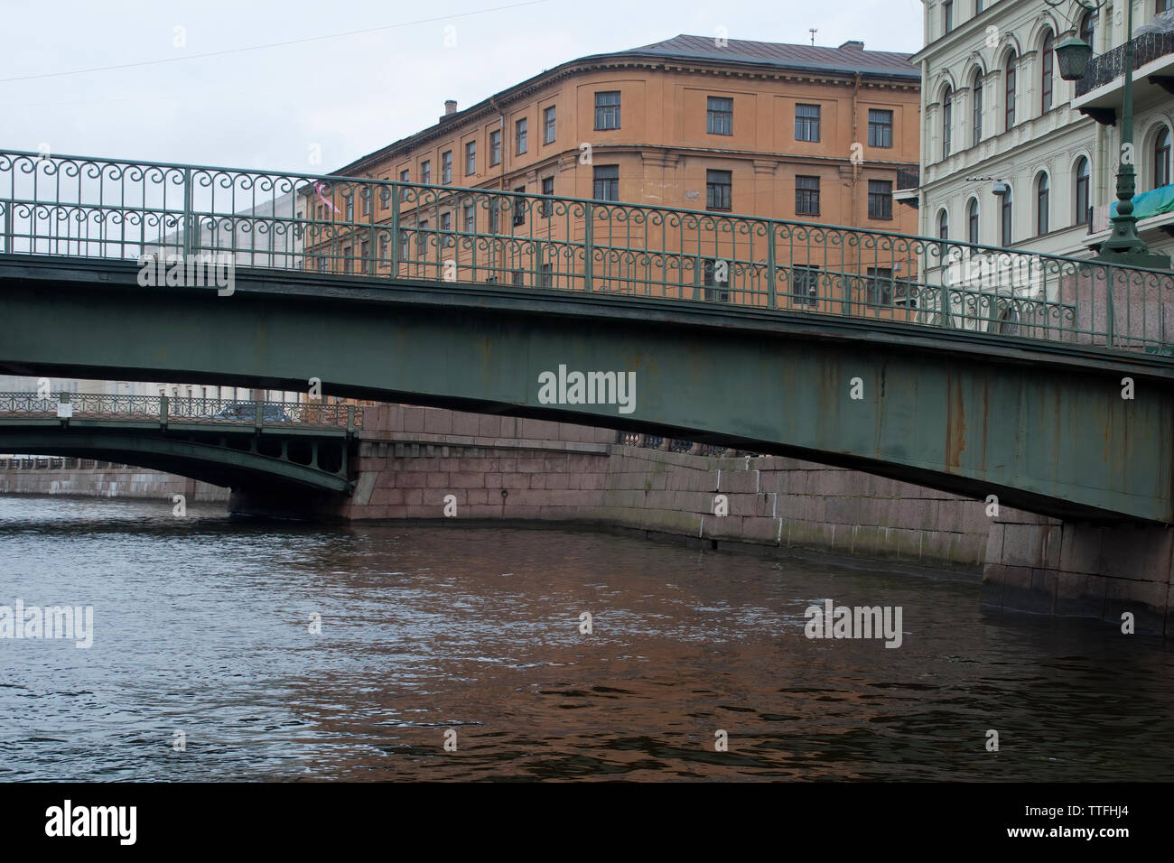 St Petersburg Russia, pedestrian footbridge over canal on an overcast ...
