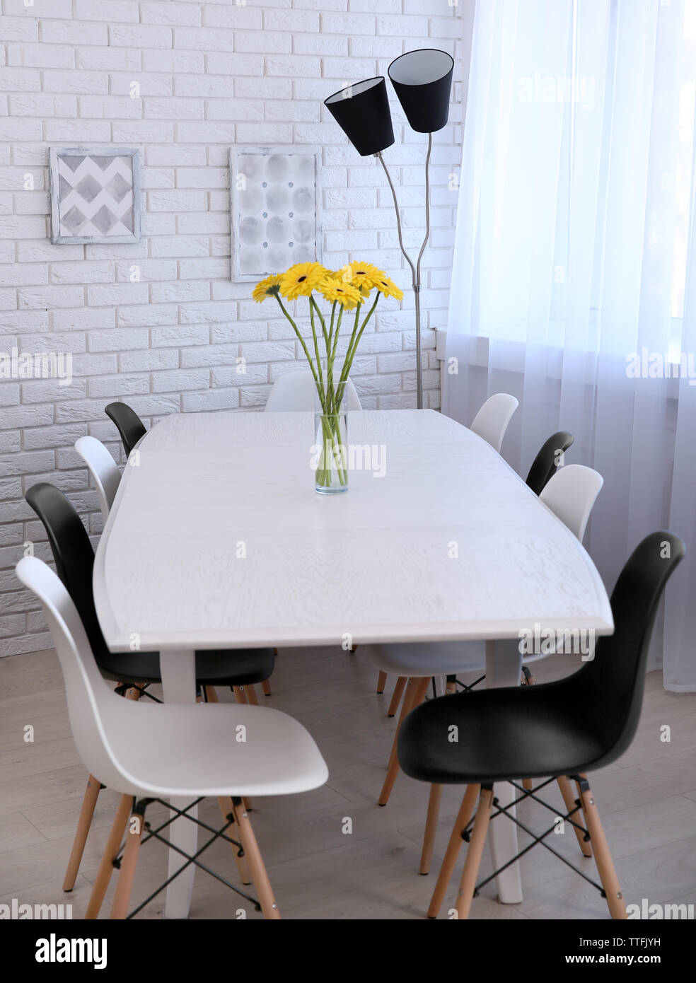 Beautiful interior with table and chairs Stock Photo - Alamy