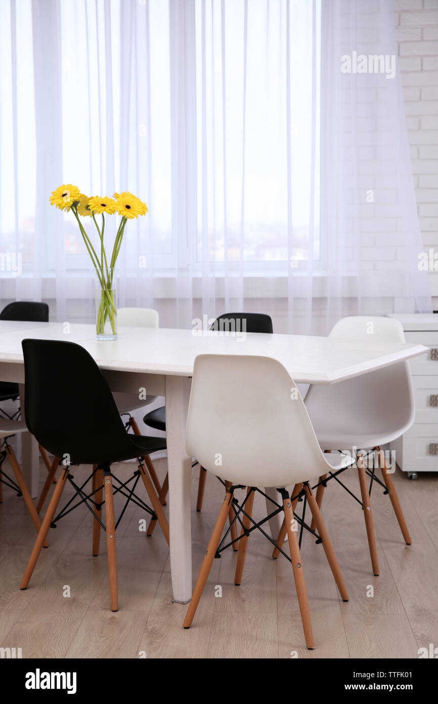 Beautiful interior with table and chairs Stock Photo - Alamy